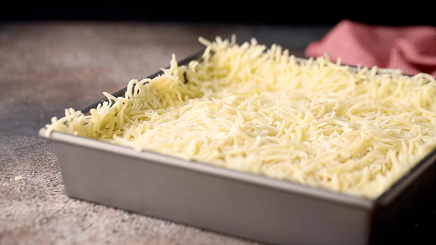 Detroit-Style Pizza: Thick, pillowy, & so cheesy! -Baking a Moment